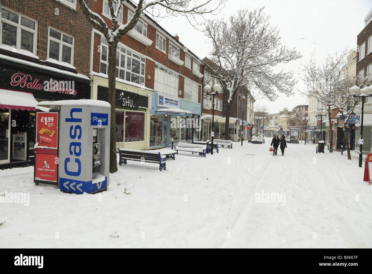 Snow falling in Eastbourne Town center, East Sussex England Stock Photo ...