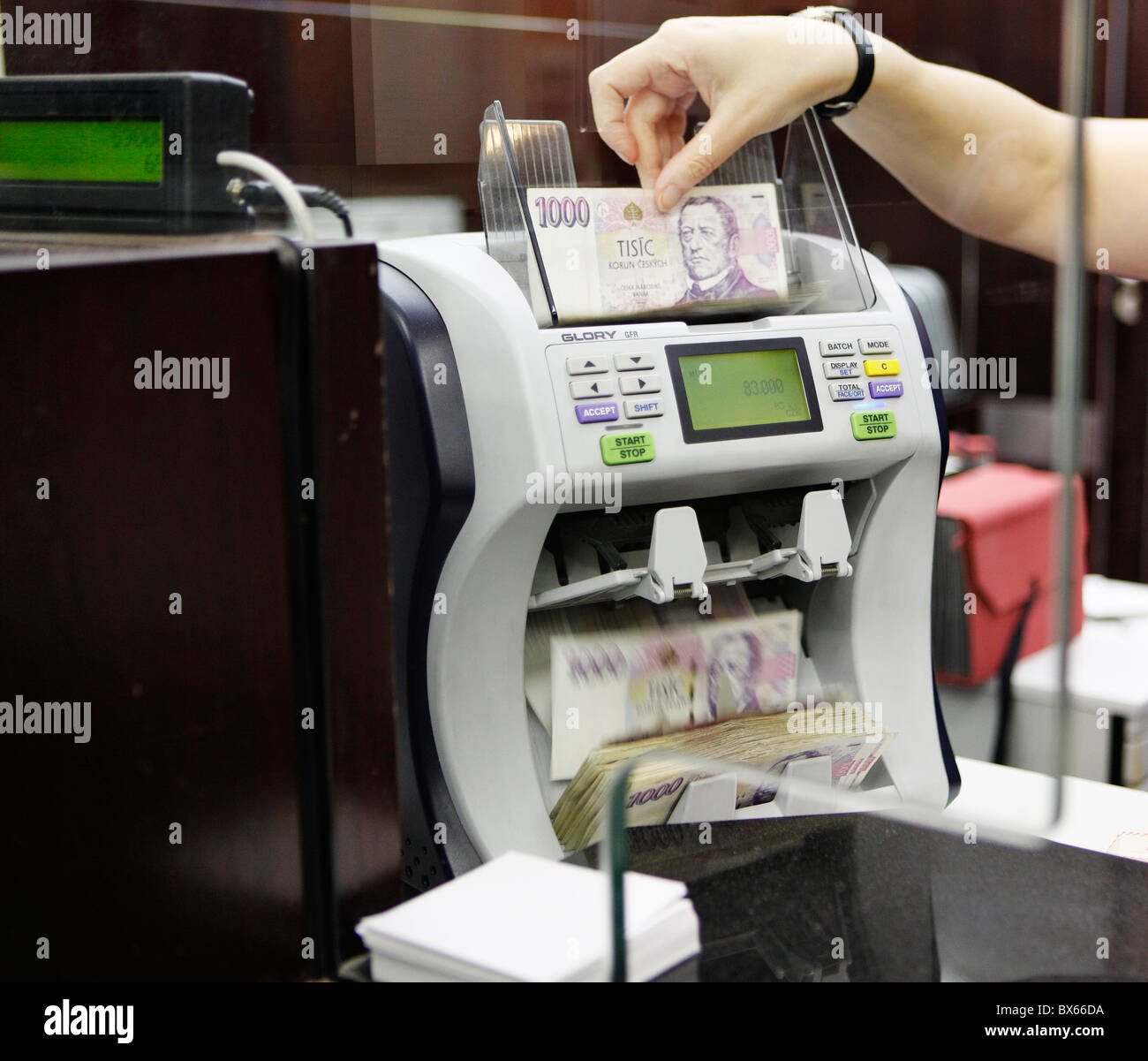 Money counter checking for counterfeit bills hi-res stock photography ...