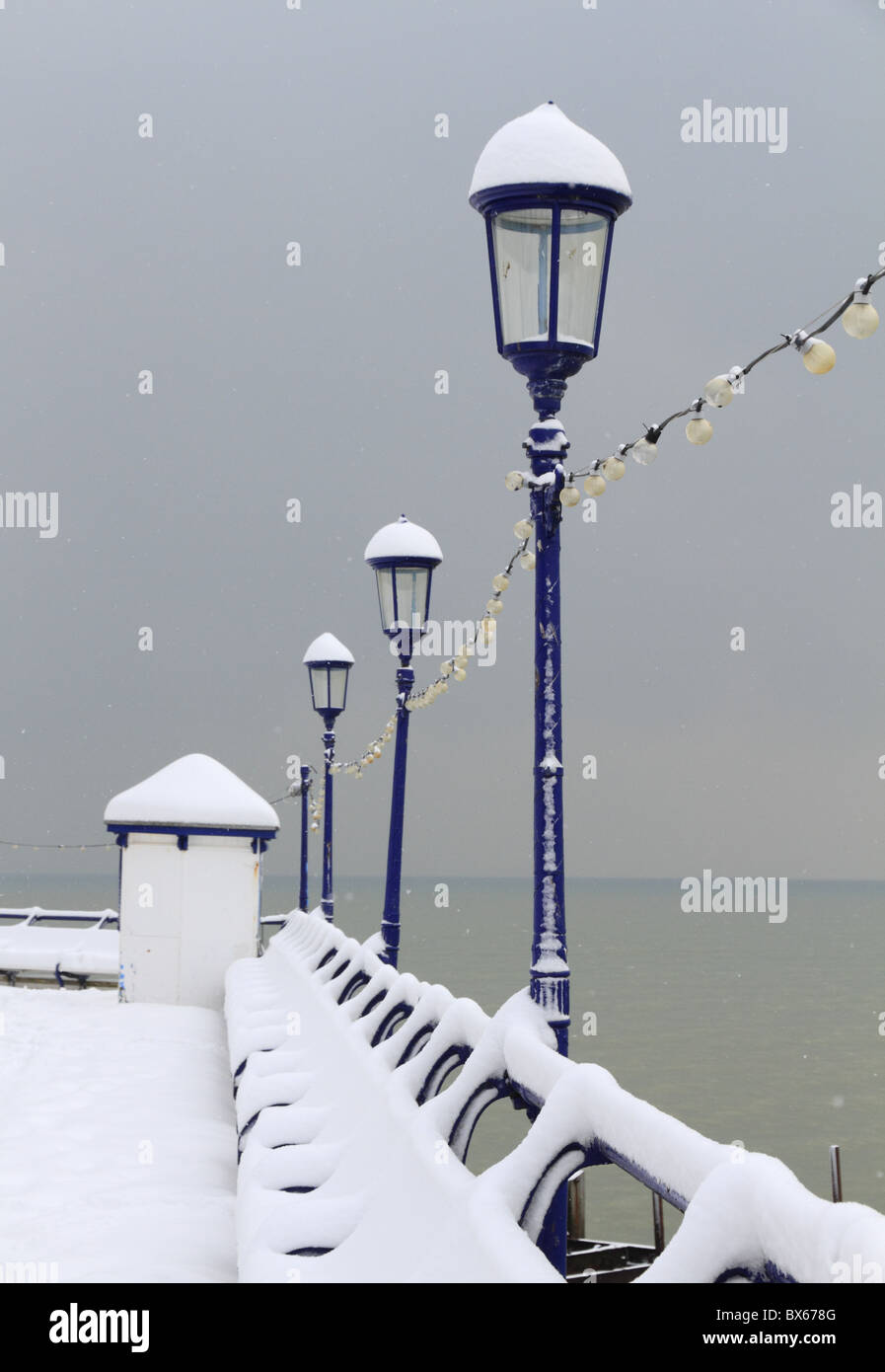Snowfall on Eastbourne Pier, East Sussex, England Stock Photo - Alamy