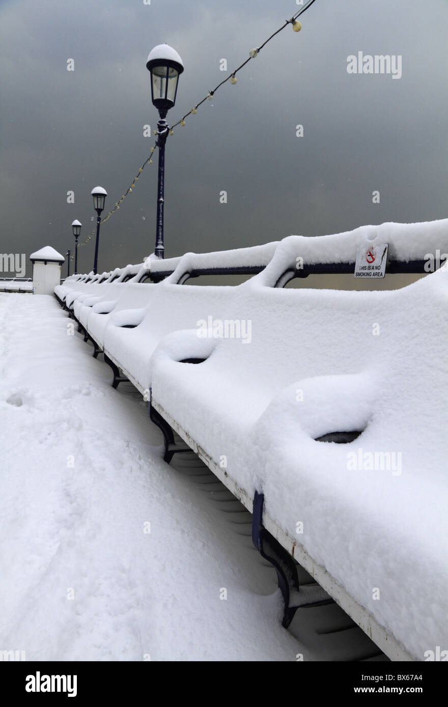Snowfall on Eastbourne Pier, East Sussex, England Stock Photo - Alamy