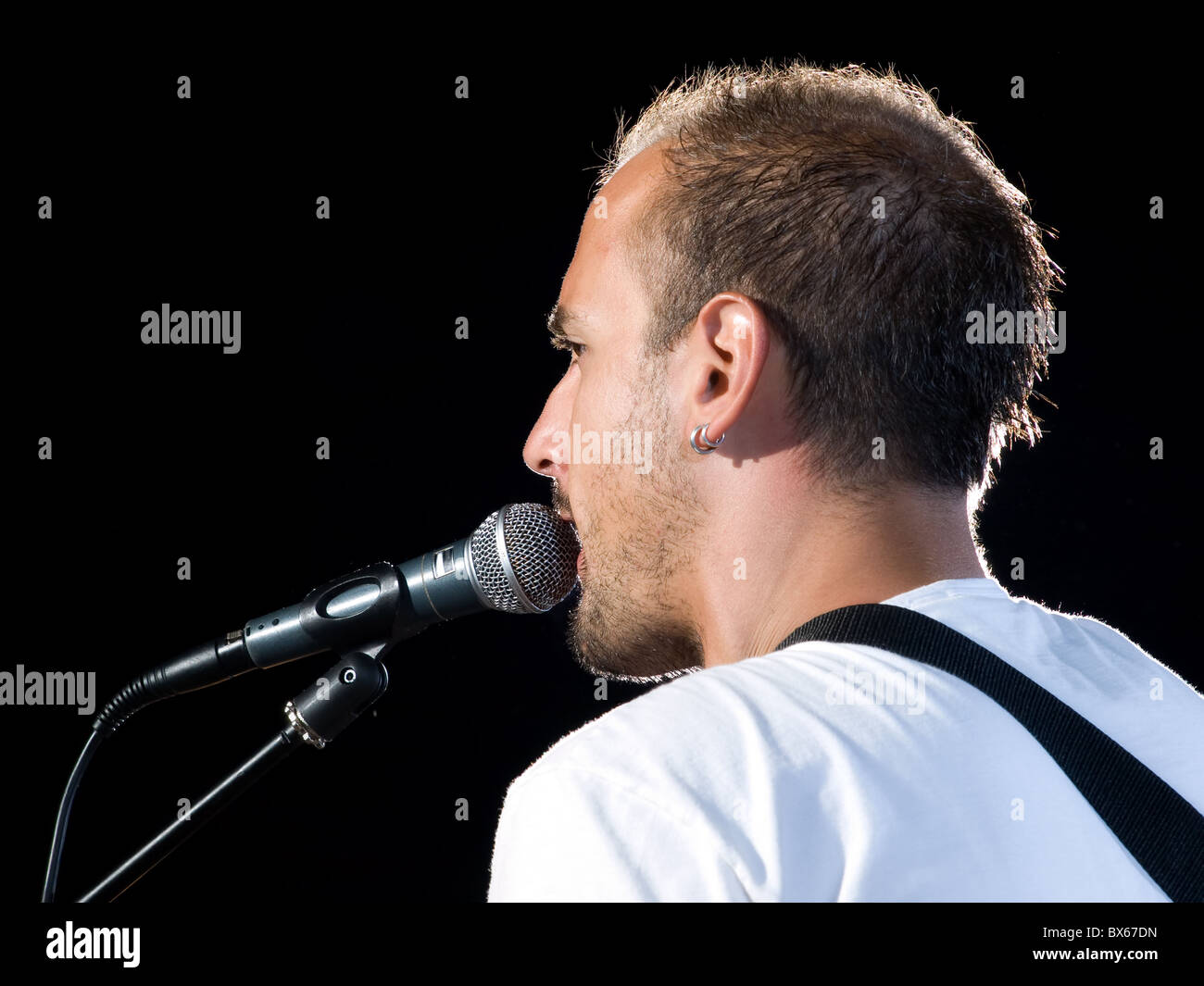Portrait of a young musician during a concert on stage... "Prezzident ...