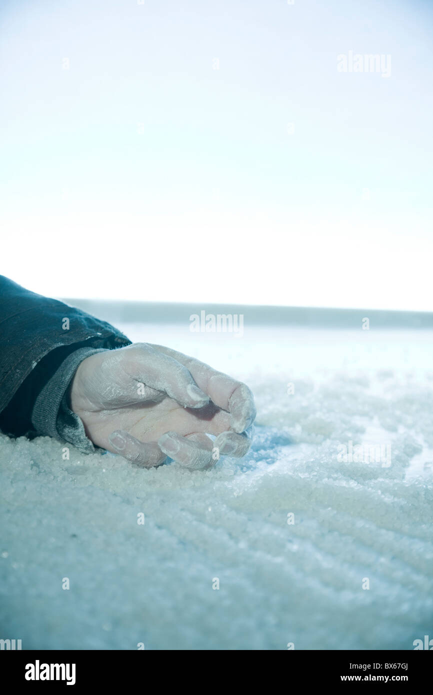 frozen hand lying on snow and ice. exterior location Stock Photo - Alamy