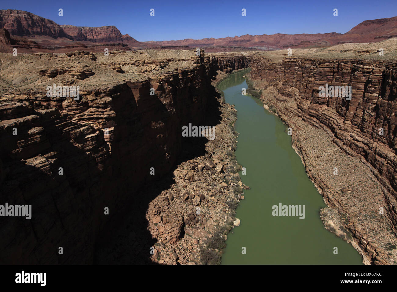 The Colorado River winds through the sheer cliffs of Marble Canyon ...