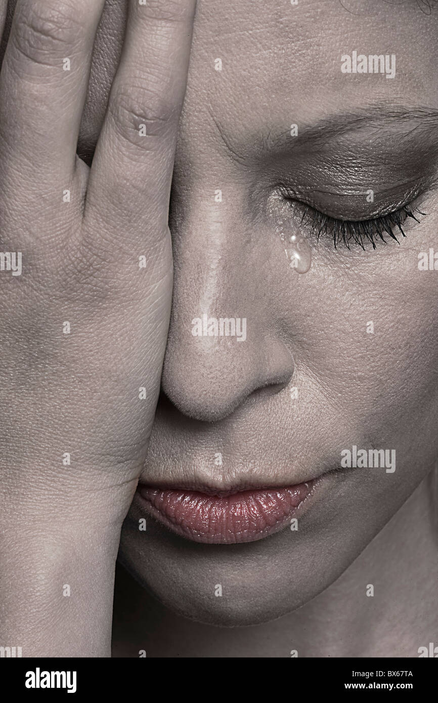 Woman crying tears sobbing grief hi-res stock photography and images ...