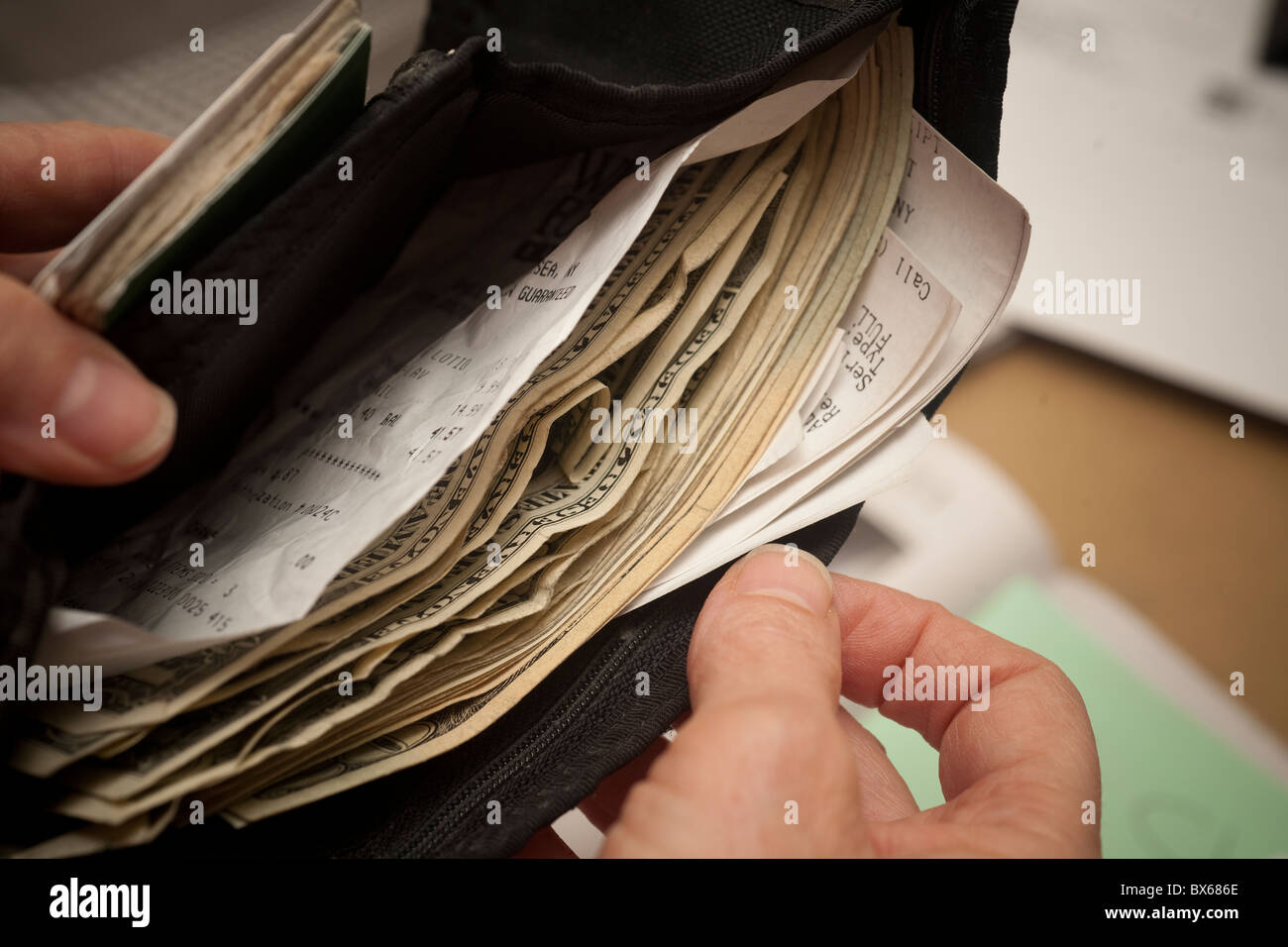 Money receipts wallet hi-res stock photography and images - Alamy