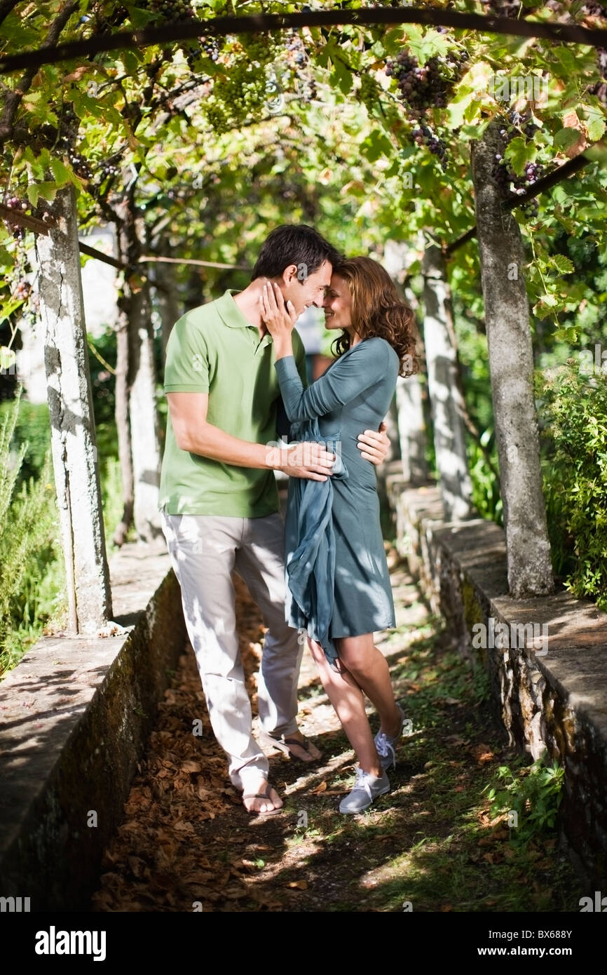 Two lovers in the green Stock Photo - Alamy