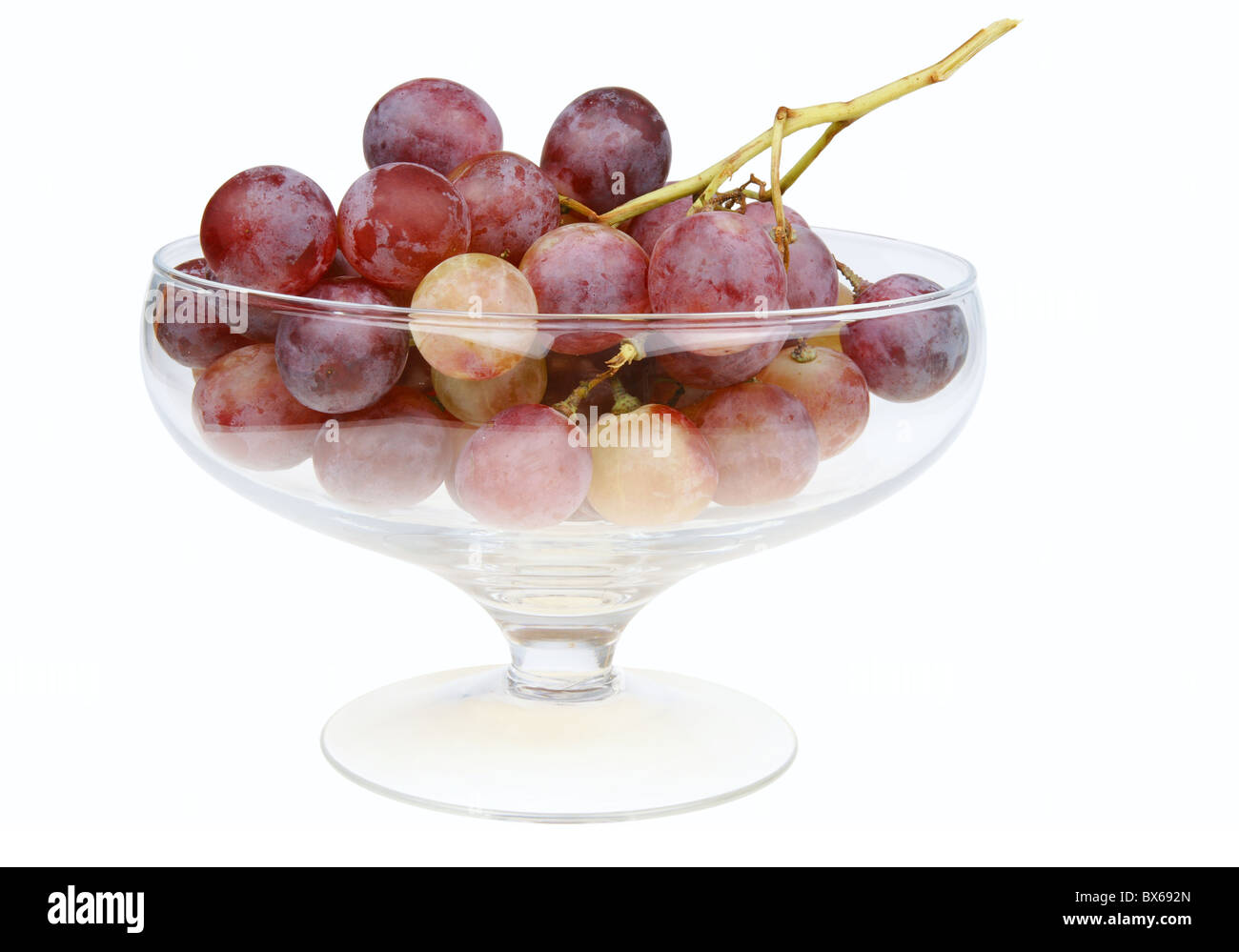 red grapes in glass isolated with clipping path Stock Photo - Alamy