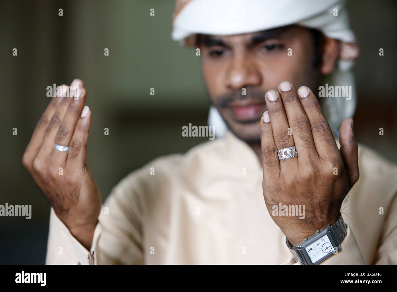 Muslim man praying, Dubai, United Arab Emirates, Middle East Stock ...