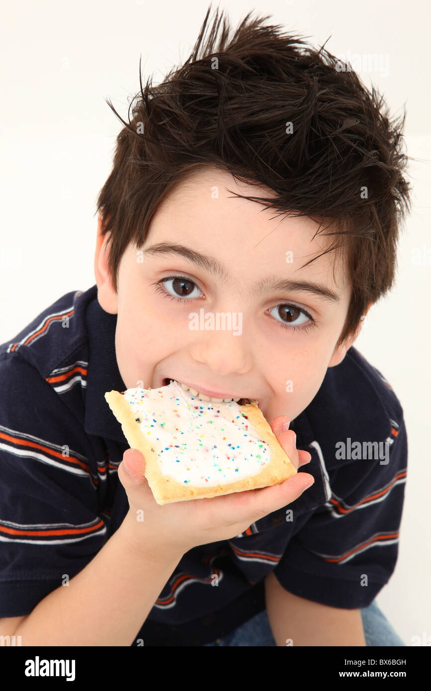 6 year old boy eating breakfast hi-res stock photography and images - Alamy