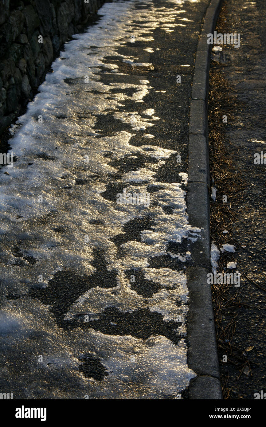 Black ice on sidewalk pavement hi-res stock photography and images - Alamy