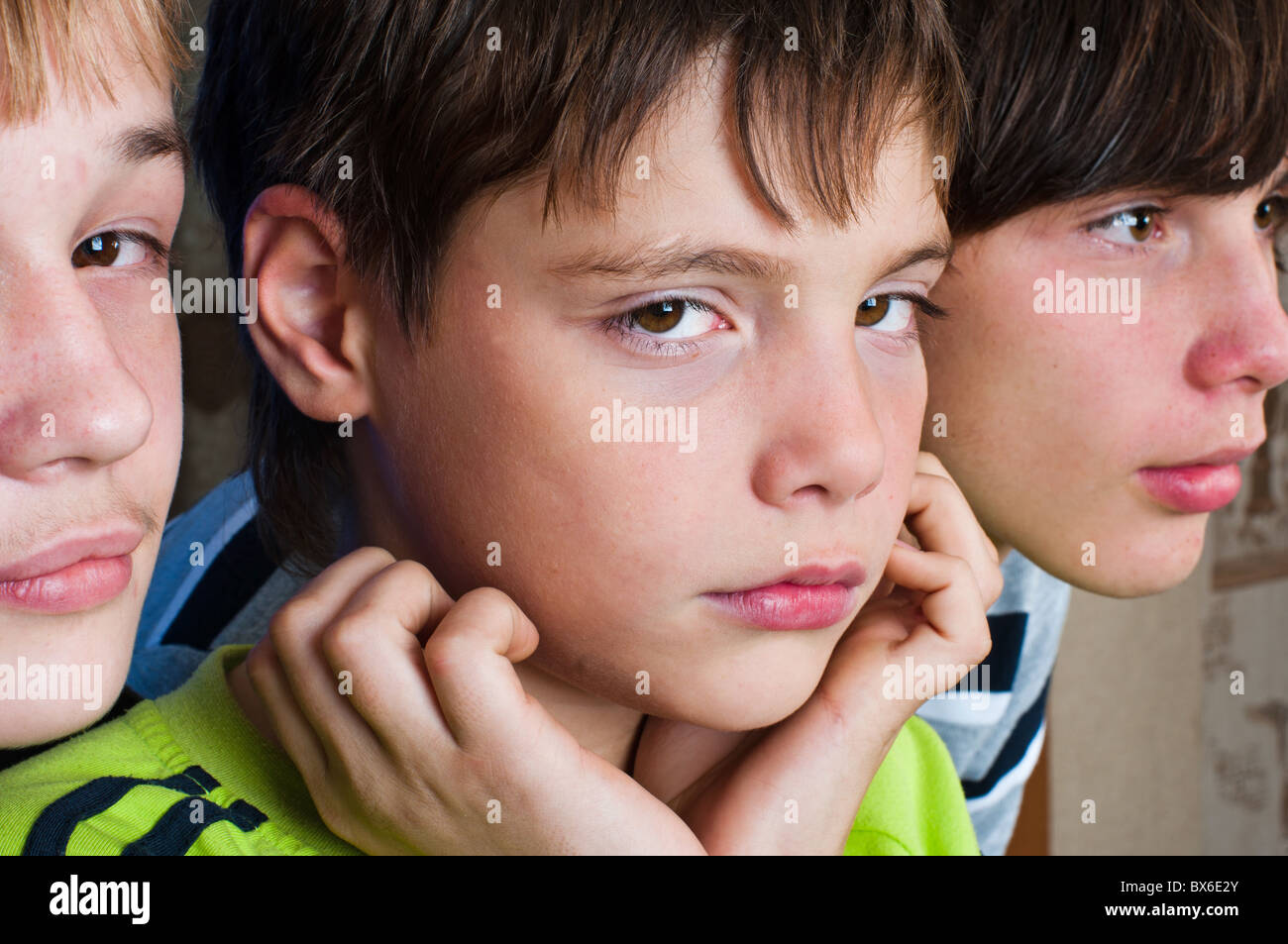 Group of teenagers among which one sad Stock Photo - Alamy