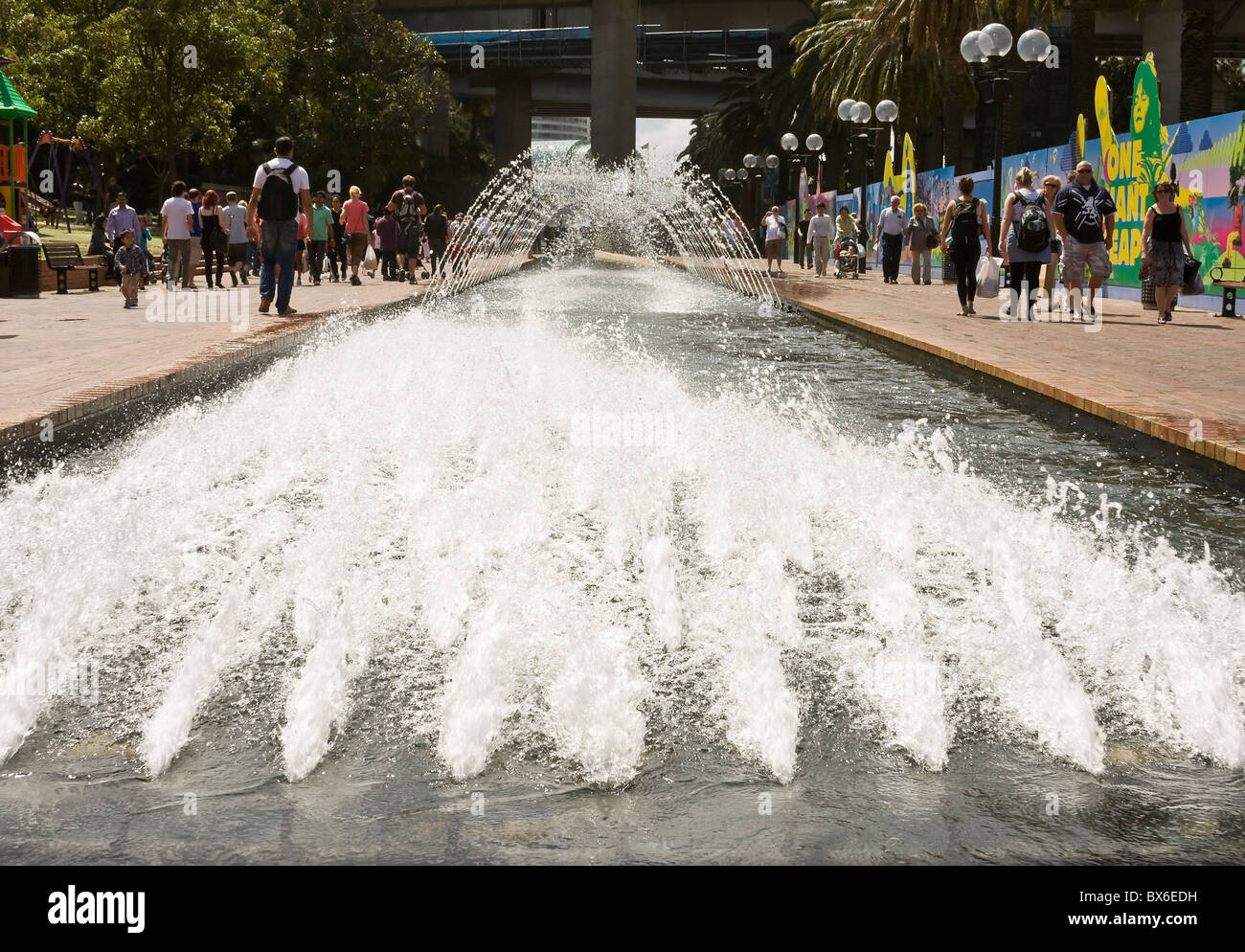Water sprouts from sprinklers in a fountain in the Darling Harbour ...