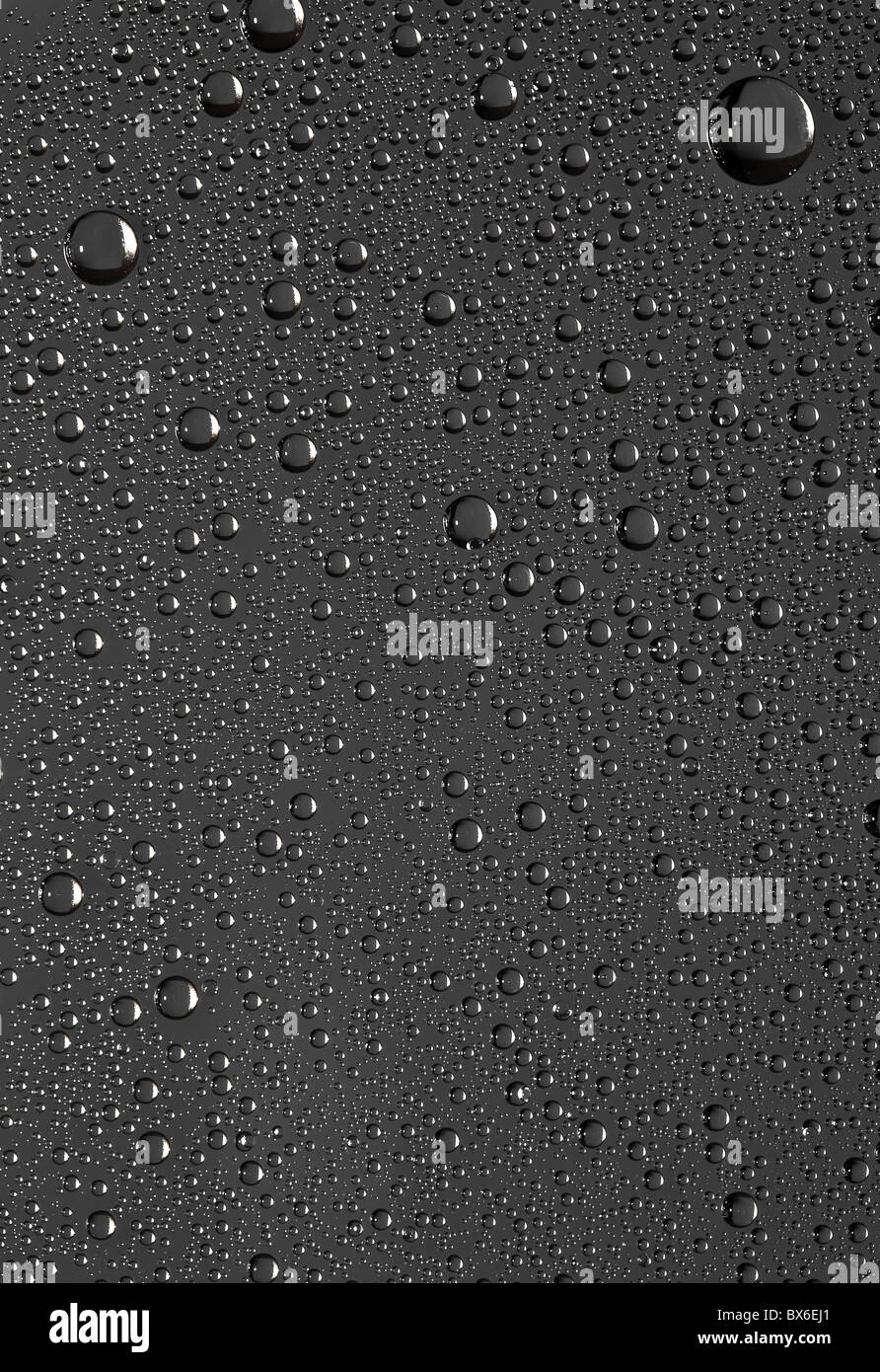 Dark water drop background Stock Photo - Alamy