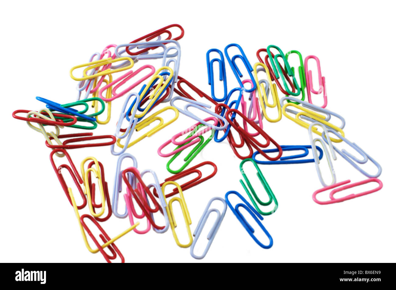 Writing paper clips of different colour on a white background Stock ...