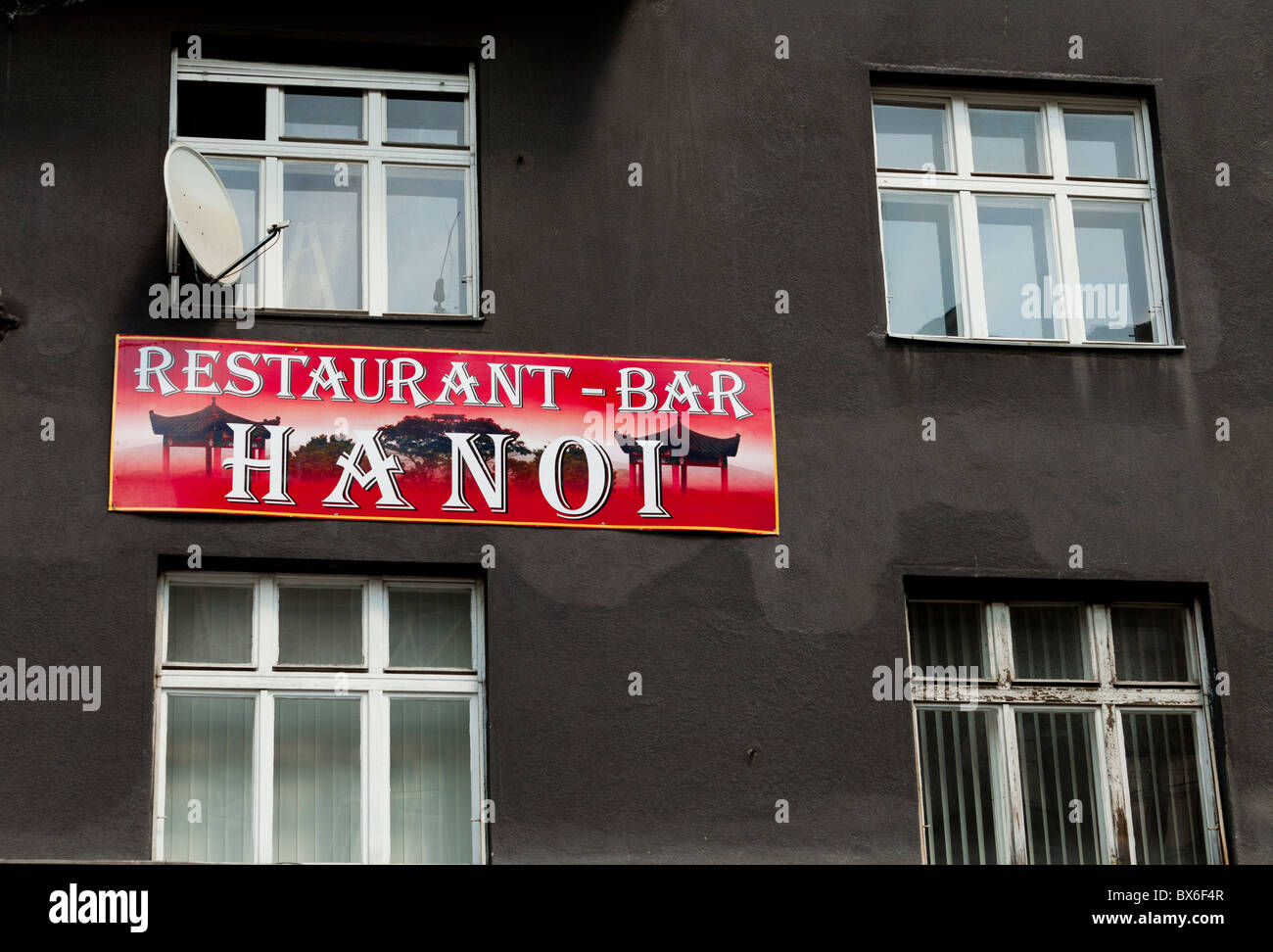 A sign Restaurant-bar Hanoi on an apartment house in Ostrava, Czech ...