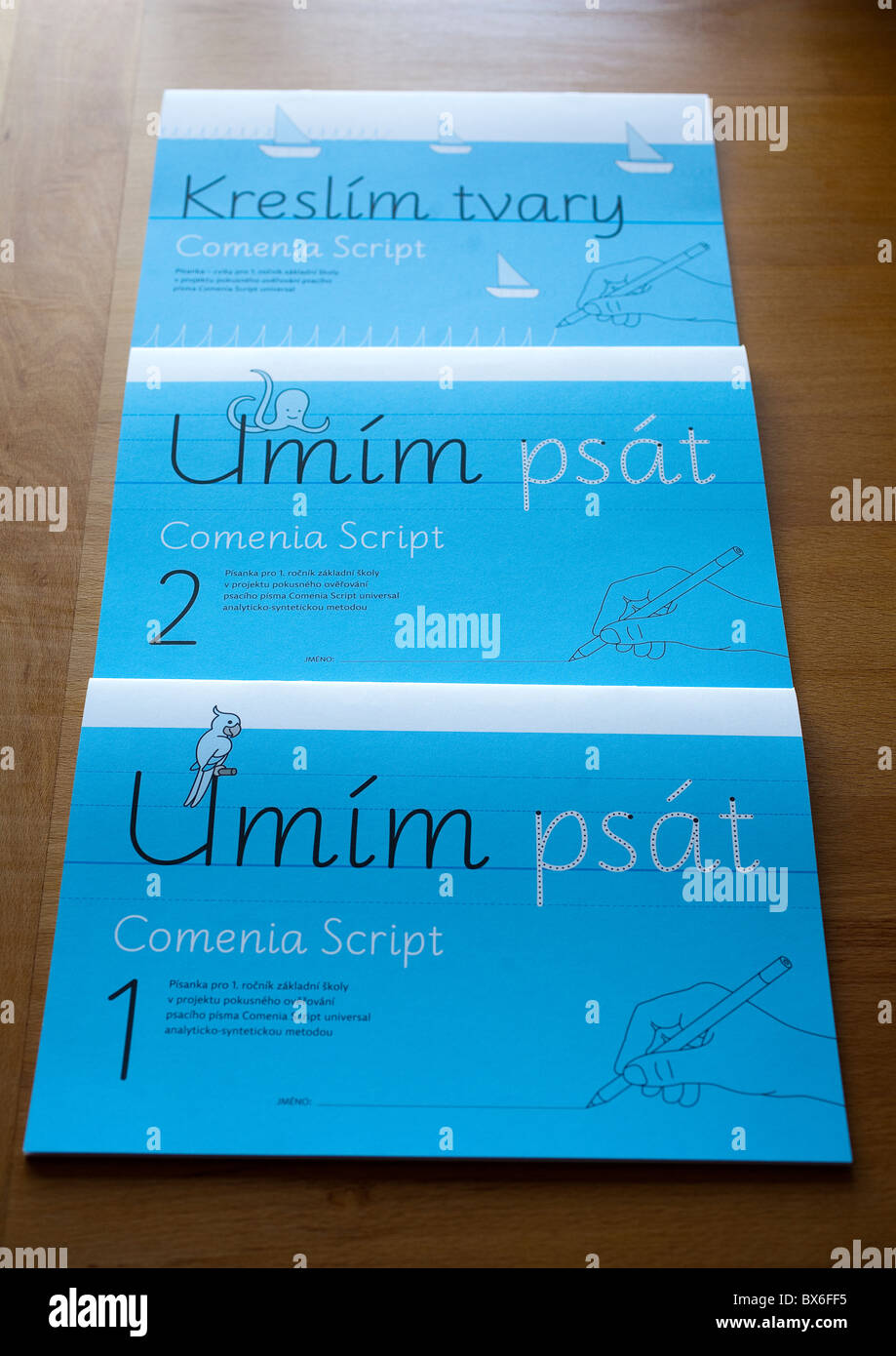Comenia Script universal, alphabet Stock Photo - Alamy