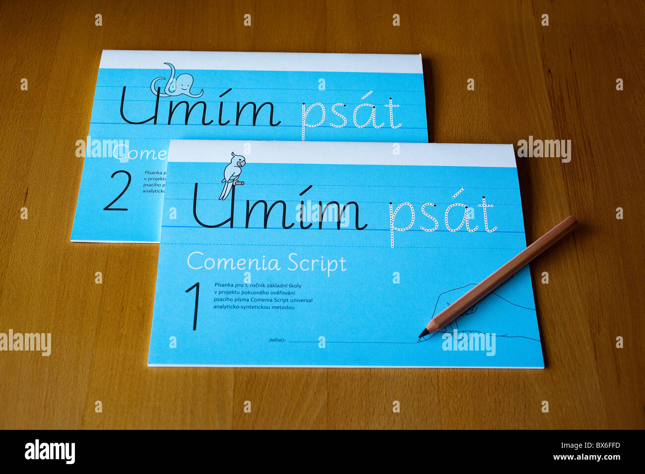 Comenia Script universal, alphabet Stock Photo - Alamy