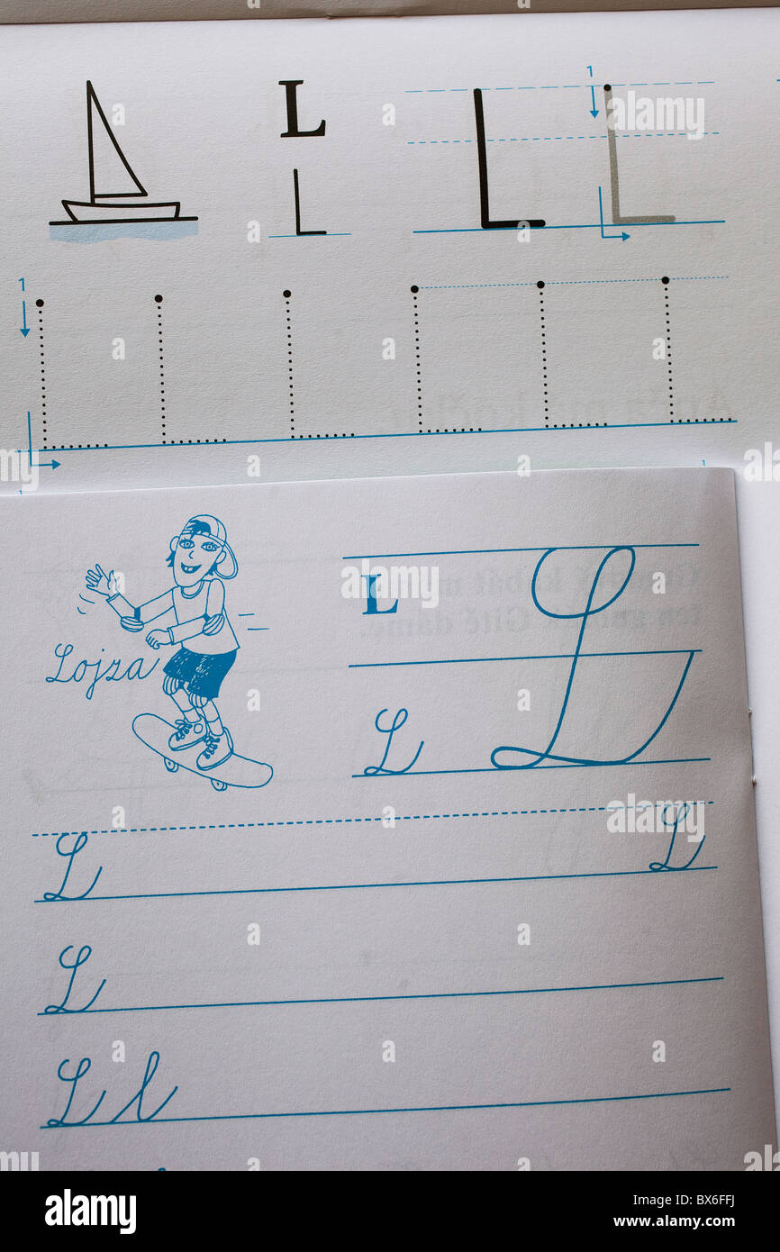 Comenia Script universal, alphabet Stock Photo - Alamy