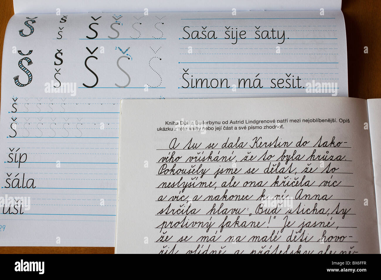 Comenia Script universal, alphabet Stock Photo - Alamy