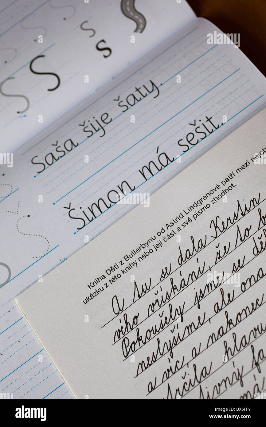 Comenia Script universal, alphabet Stock Photo - Alamy