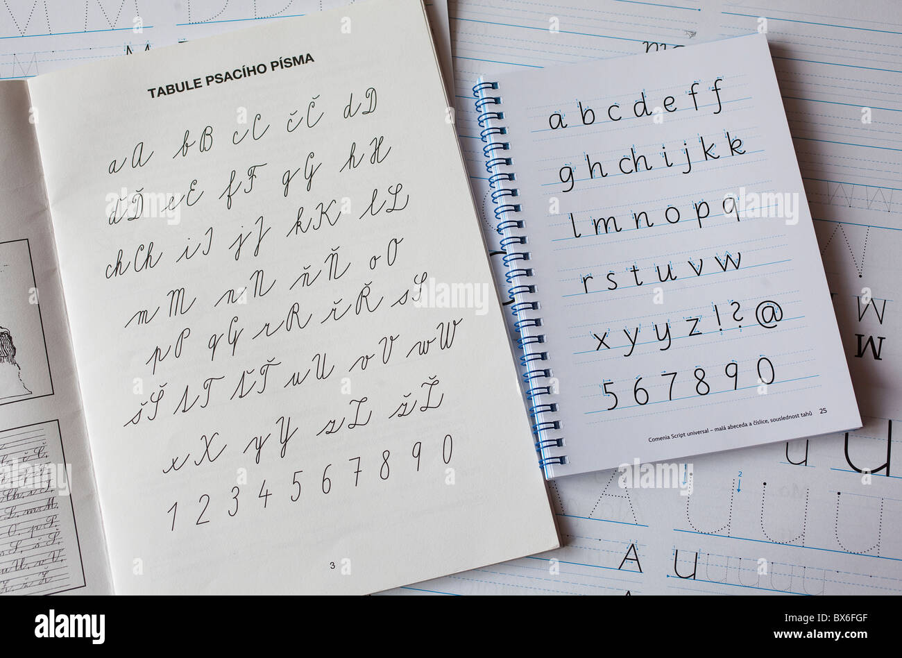 Comenia Script universal, alphabet Stock Photo - Alamy