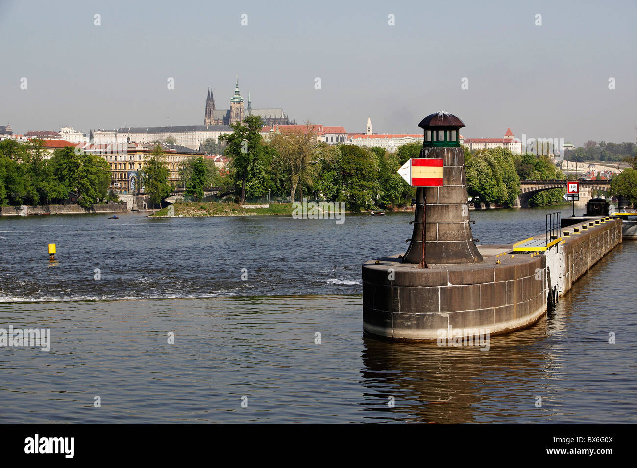 Prague, Prague's Castle with Vltava River, sign on stone column directs ...