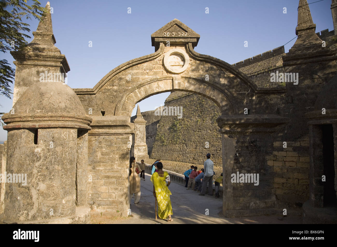 Woman in sari by old building diu india hi-res stock photography and ...
