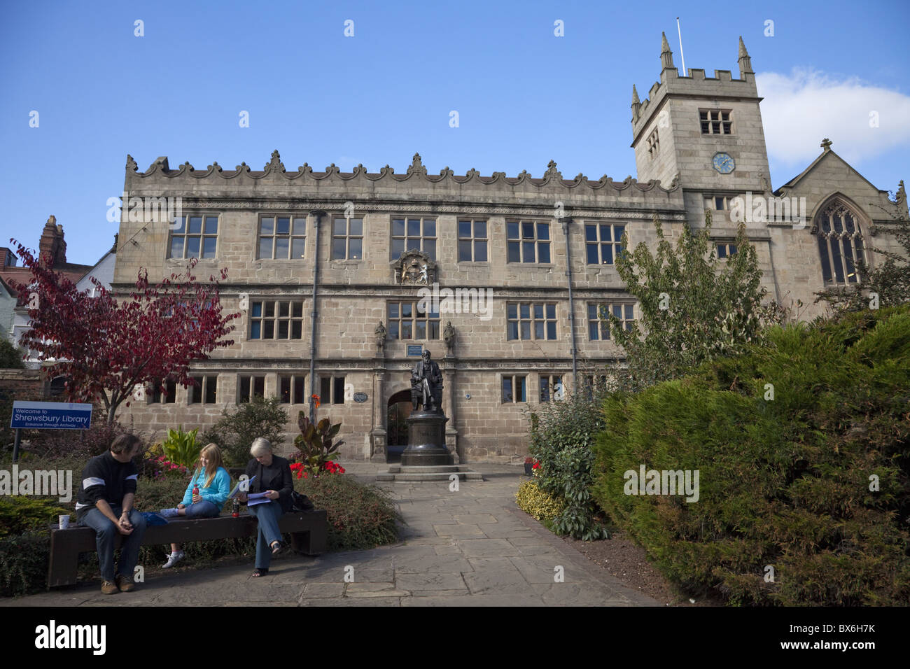 Visitors sitting in front of Statue of Charles Darwin outside Public ...