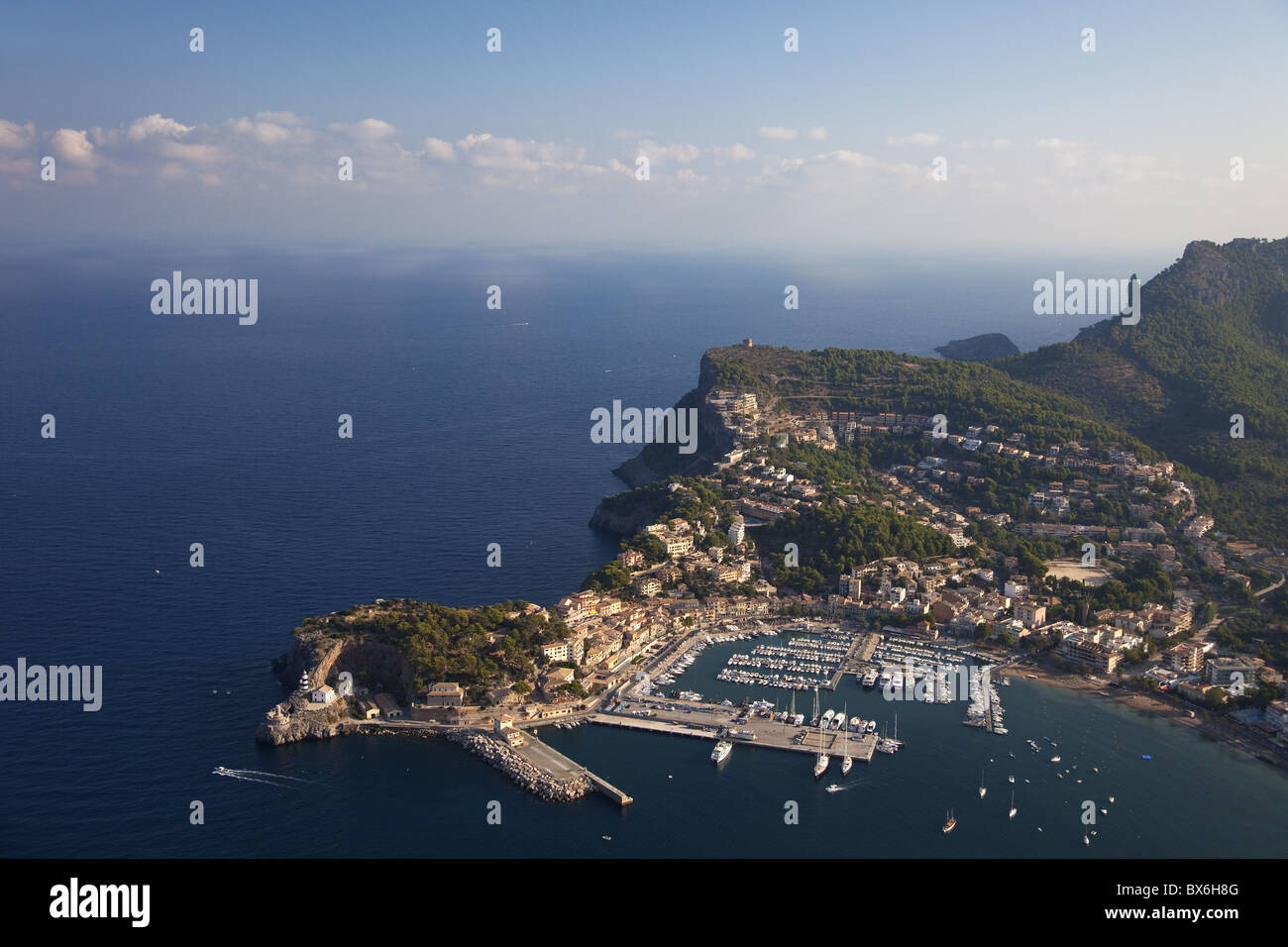 Aerial view of Soller harbour and northern coastline of Majorca in ...