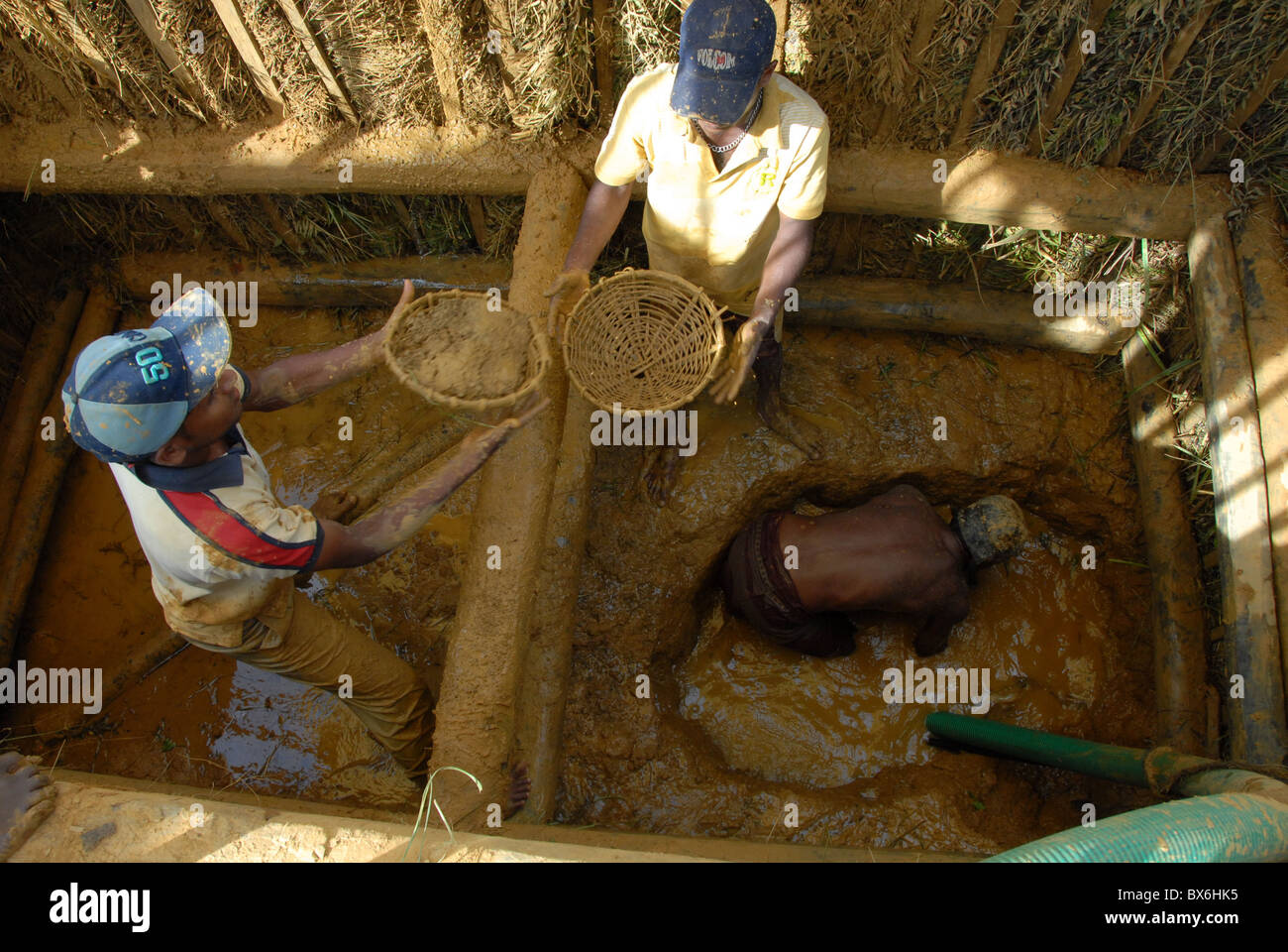 Hand-dug pit to extract sapphires and other gemstones, Ratnapura ...