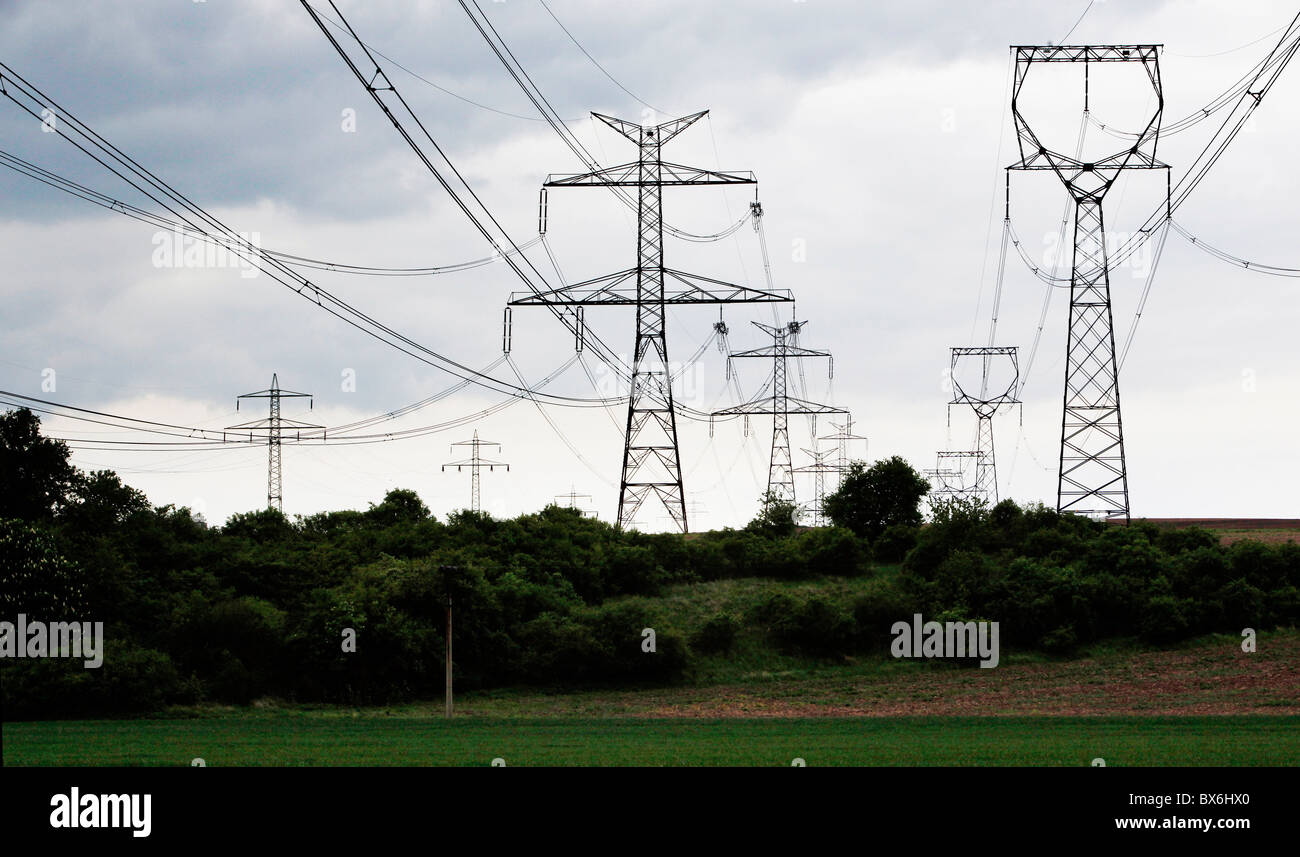Line of electricity pylons hi-res stock photography and images - Alamy