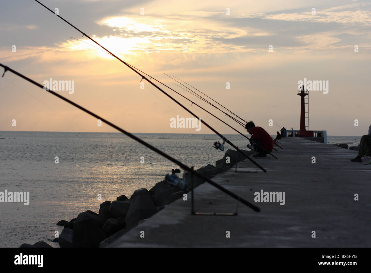 People fishing at the entrance to AnPing Harbor Tainan, Taiwan Stock ...