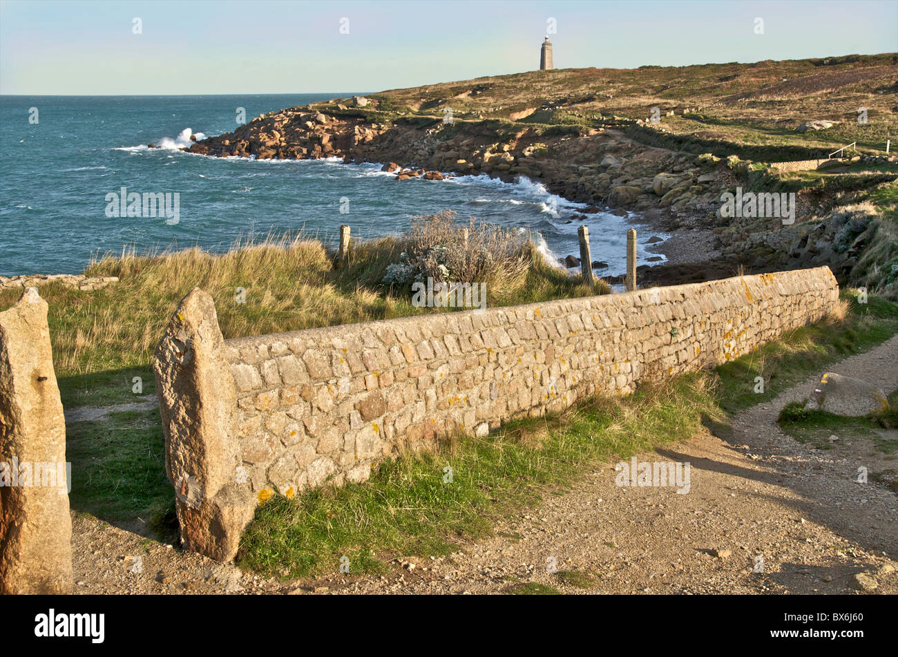 Landscape with typical stone wall with cross country walk and ...