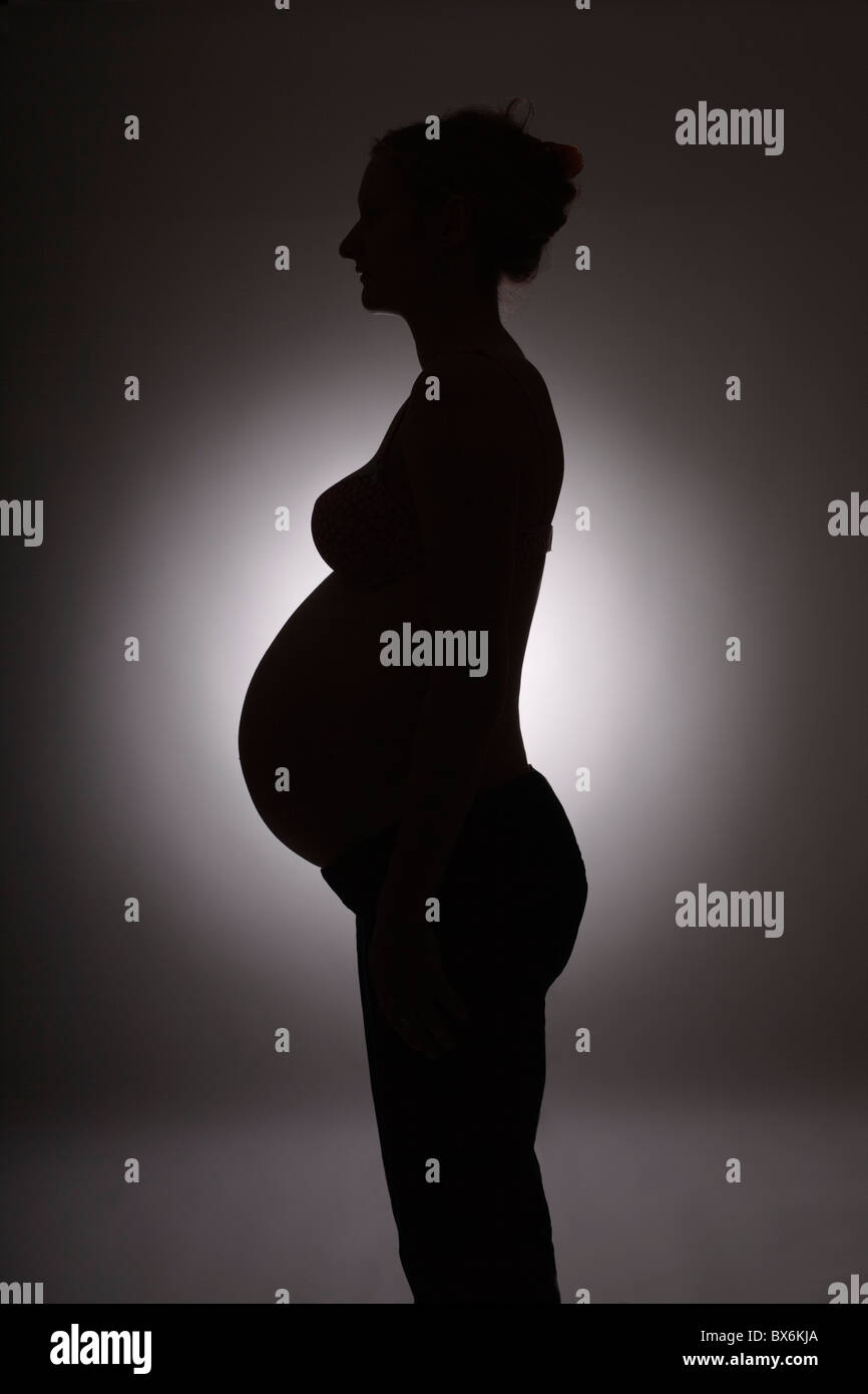 Pregnant young woman, pregnancy, belly, family. (CTK Photo/Josef ...