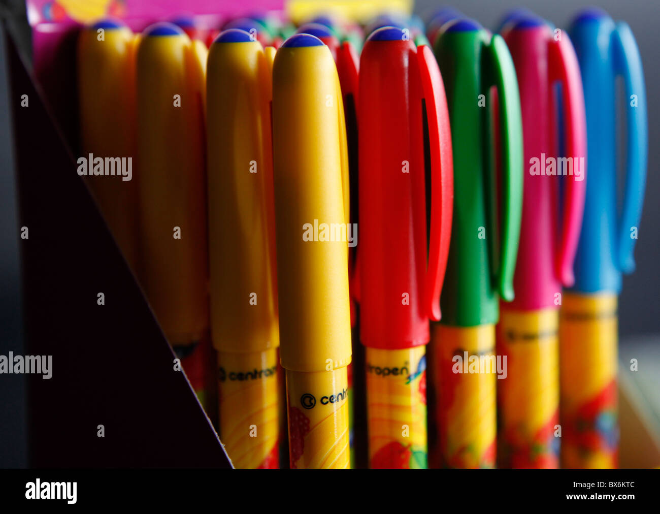 A box with new series of triangular shaped pens for first-graders ...