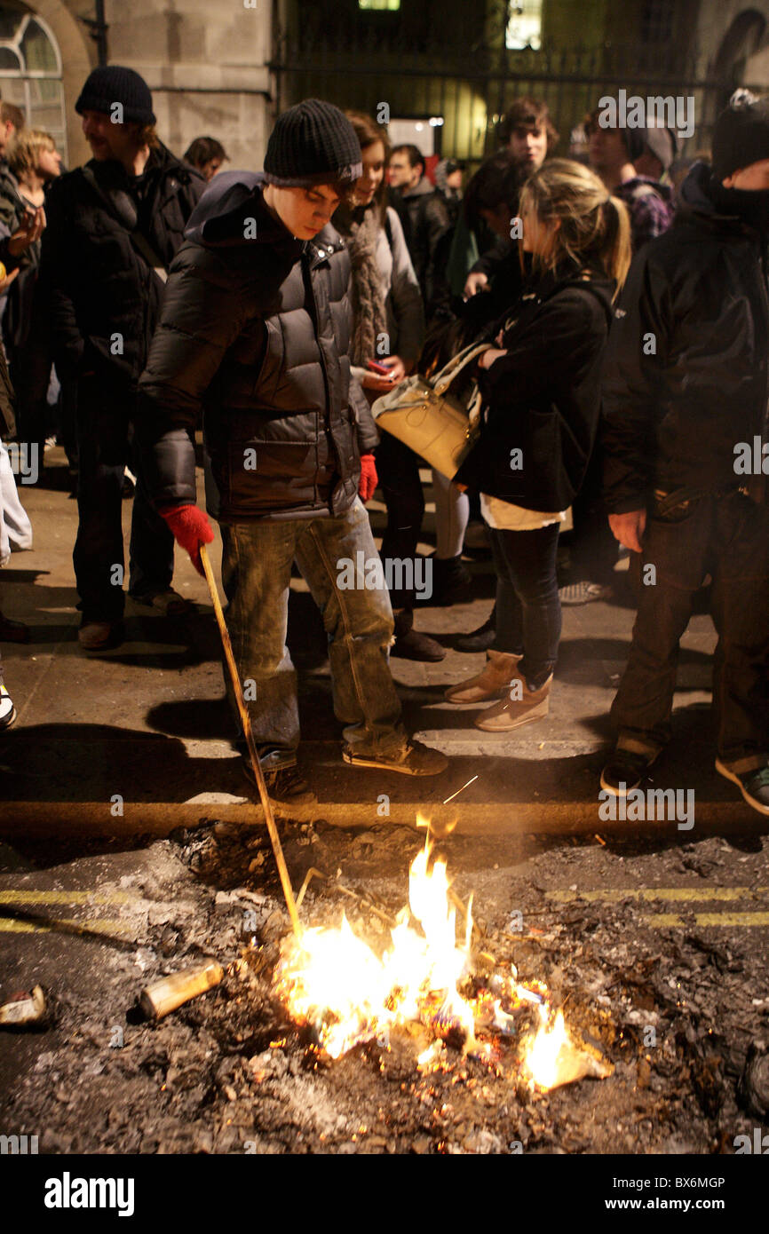 Protesters light fires during demonstration Stock Photo - Alamy