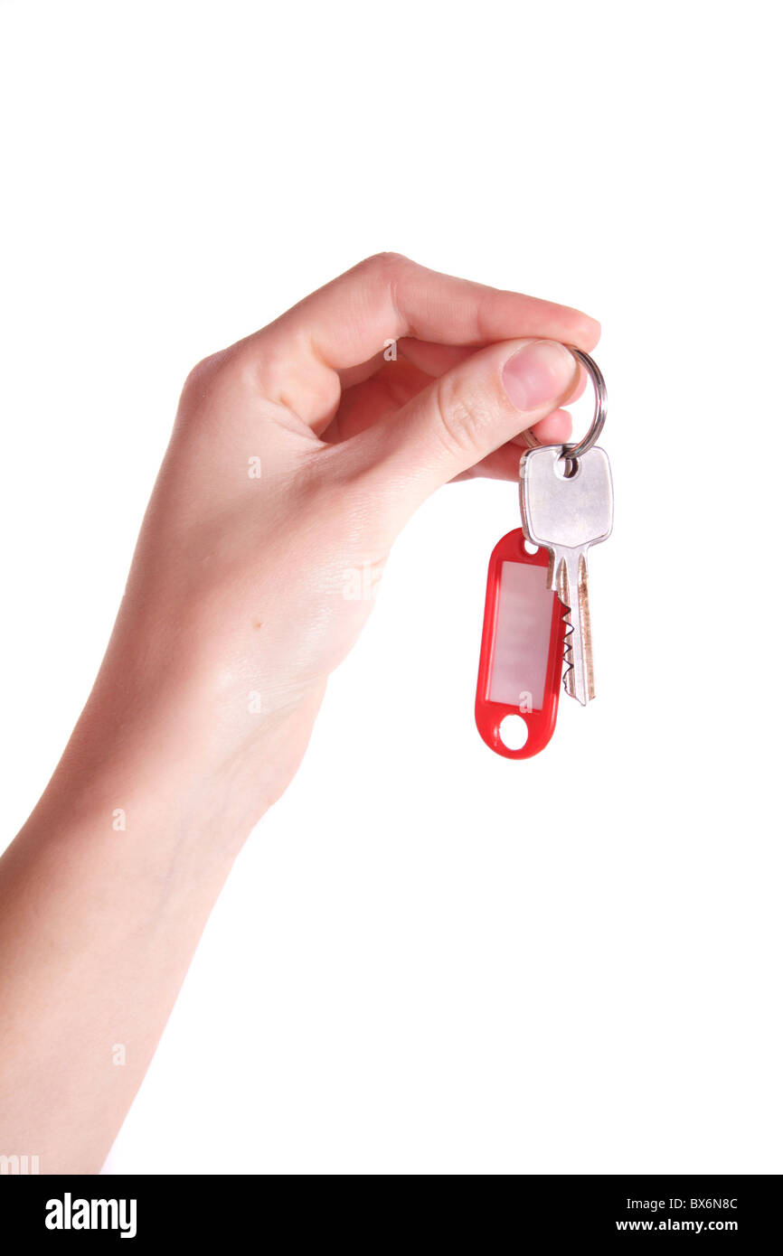 Someone handovers some keys. All isolated on white background Stock ...