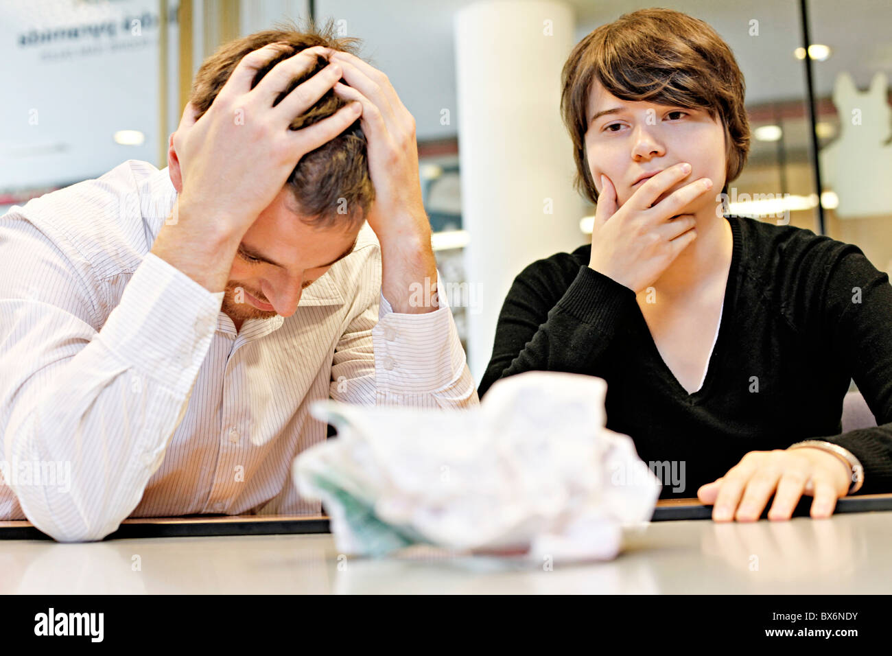 Desperate clients at a meeting in a bank. (CTK Photo/Martin Sterba ...