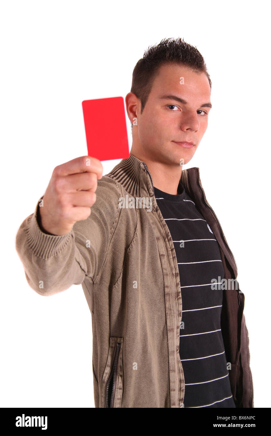 A fierce teenager showing someone the red card. All isolated on white ...