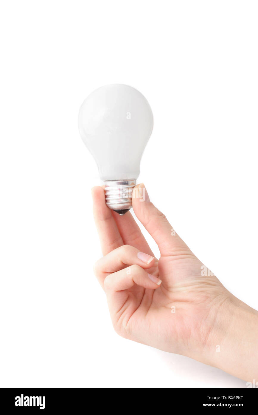 A human hand holding a light bulb. All isolated on white background ...