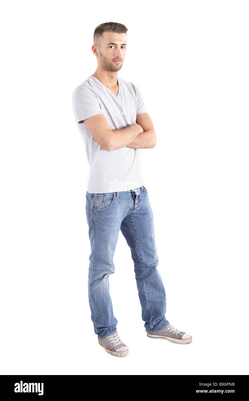 A handsome man standing in front of a white background Stock Photo - Alamy