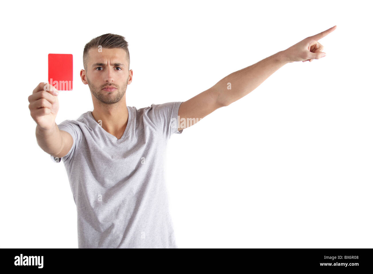 A handsome man shows someone a red card. All isolated on white ...