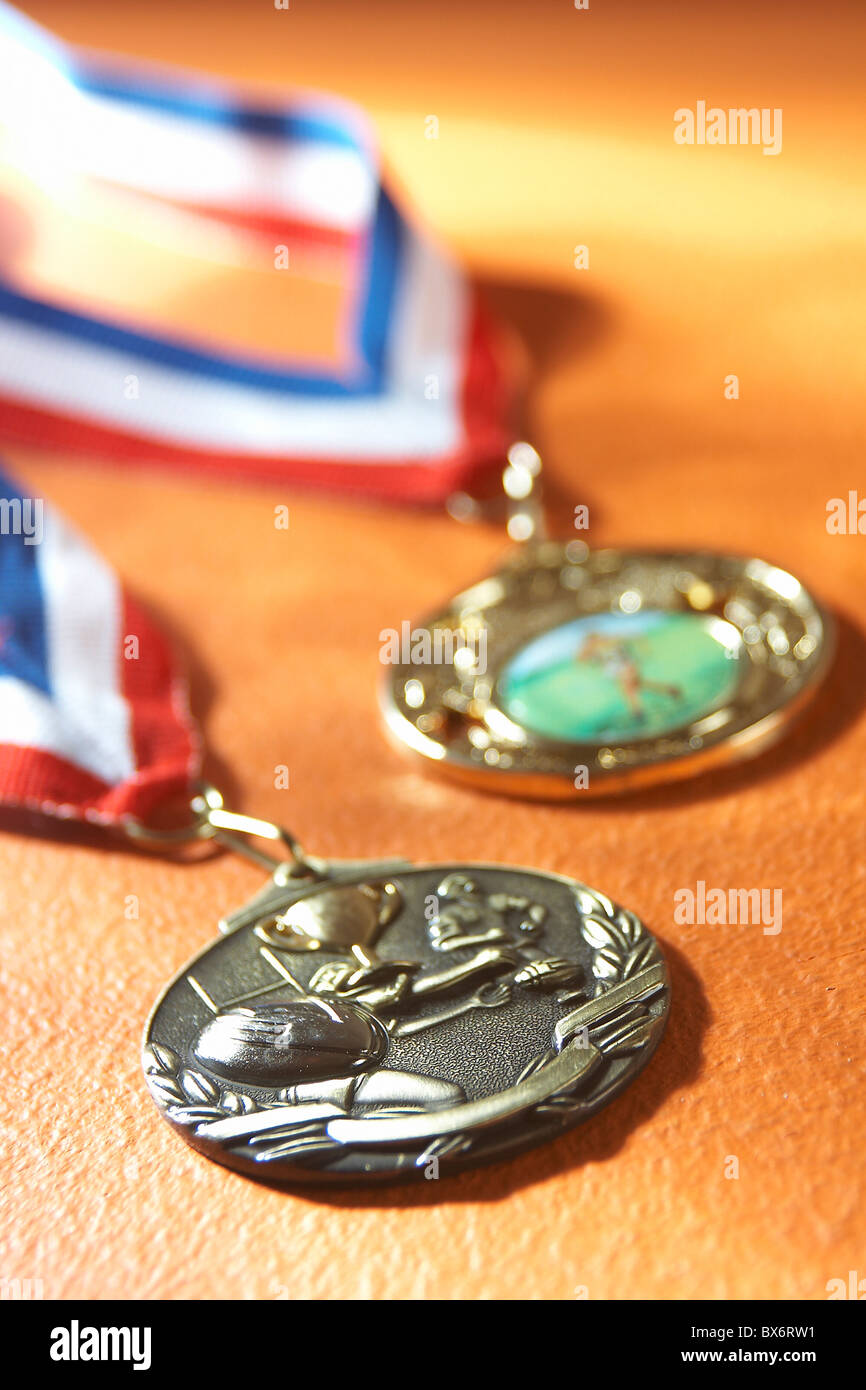 Studio shot of competition medals with ribbons Stock Photo - Alamy