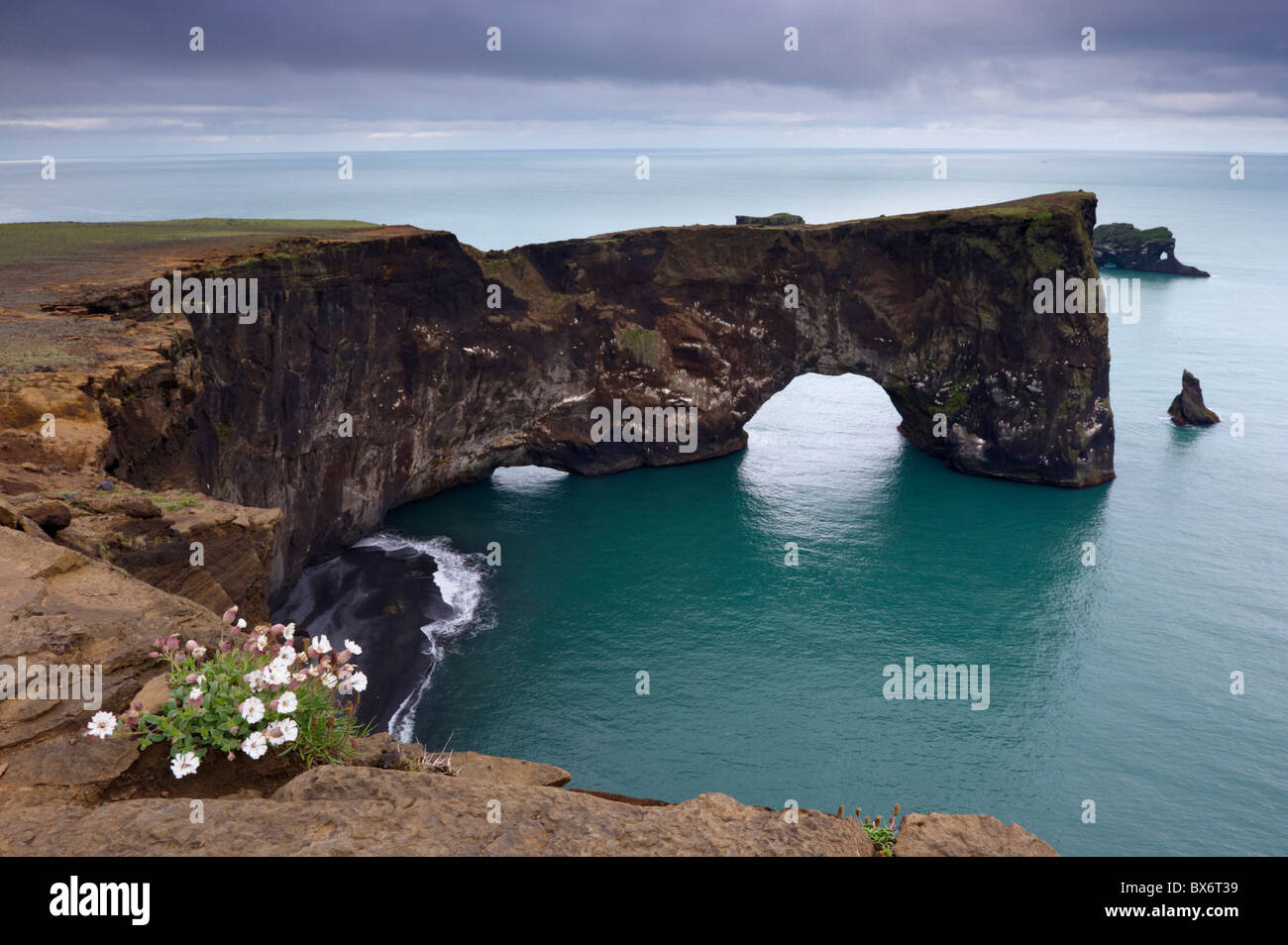 Dyrholaey natural arch, the southernmost point in Iceland, near Vik, in ...