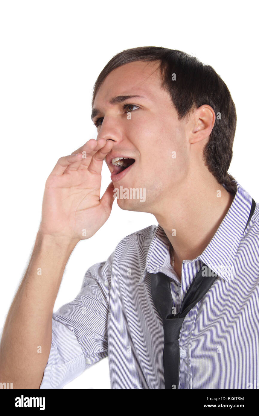 A handsome young man yelling. All isolated on white background Stock ...