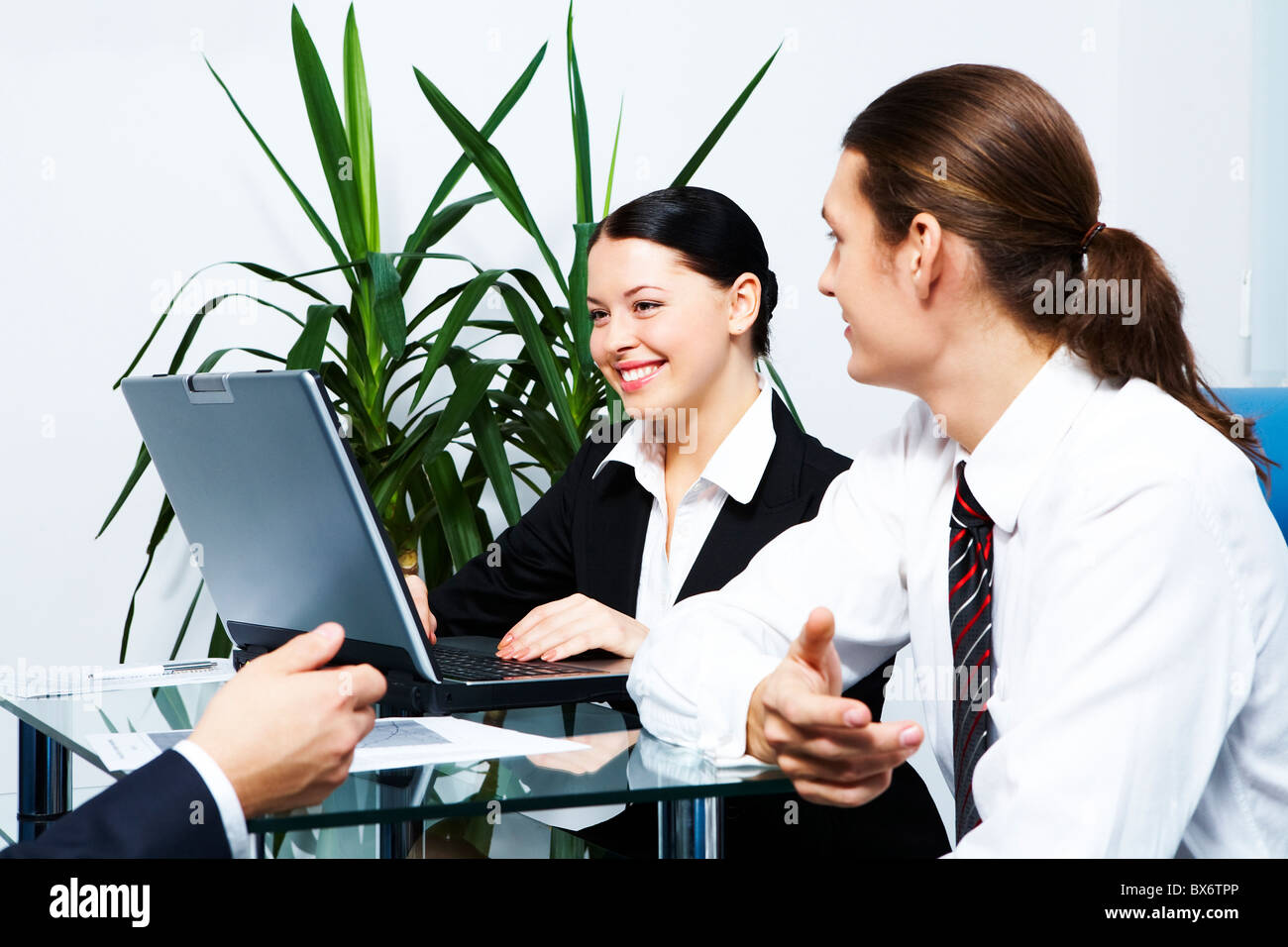 Photo of secretary and her colleague communicating during work Stock ...