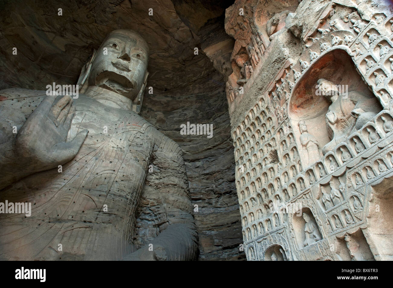 Yungang Grottoes - Giant Buddha statue carved inside the ancient ...
