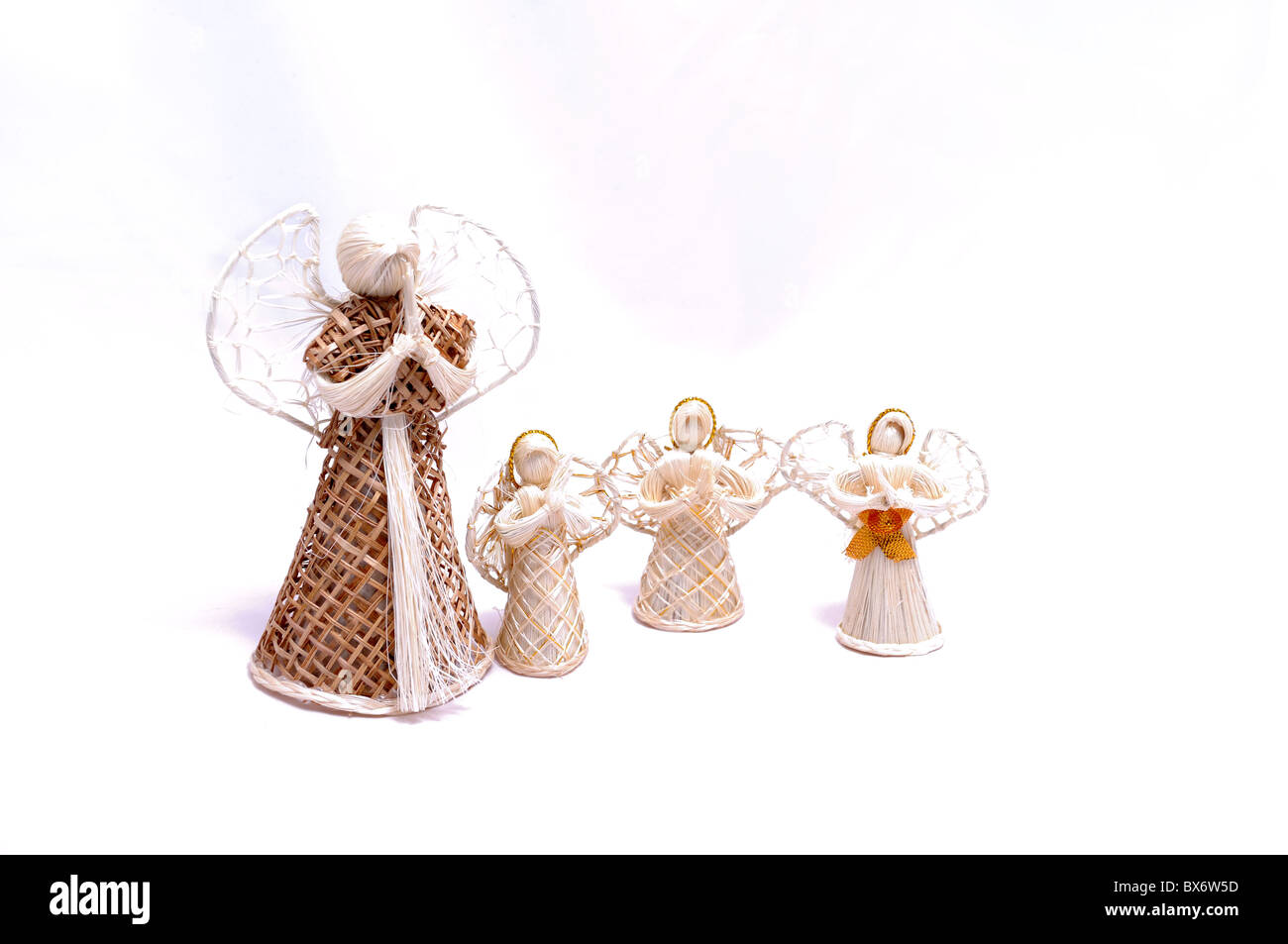 White Christmas straw angel ornament isolated on white background Stock ...