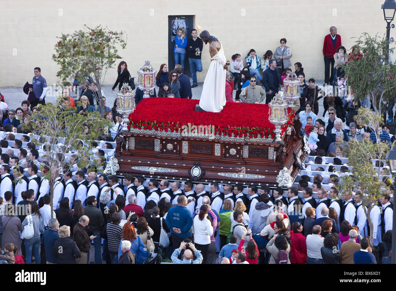 Religious float being carried through the streets during Semana Santa ...