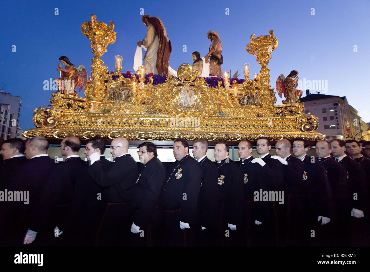 Religious float being carried through the streets during Semana Santa ...